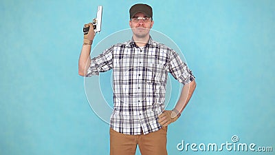 Man Shooter Athlete with a Gun and Glasses Looking at the Camera ...