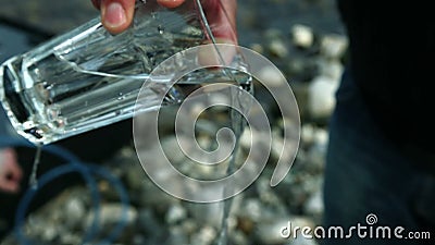 A Man Spilling Water on a Ground Stock Footage - Video of pollution ...