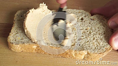 Man Spreading Butter on a Bread Slice Close Up Shot Stock Video - Video ...