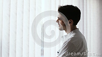 A Man Standing in Half a Turn and Starts Smiling Stock Video - Video of ...