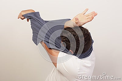 Man Stuck In His Shirt Royalty Free Stock Images - Image: 21646579