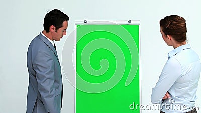 Man in Suit Explaining Something on a Board Stock Footage - Video of ...