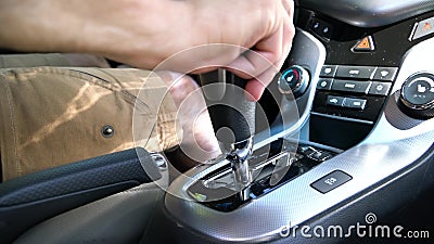 A Man Switches the Selector of the Automatic Transmission in Parking ...