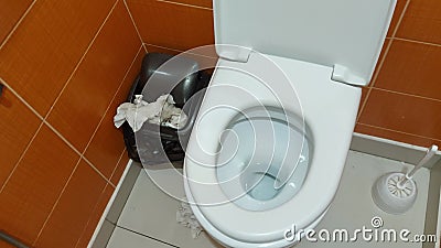 A Man Throws Toilet Paper on the Toilet Floor. Uncleaned Toilet, Litter ...