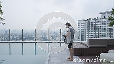 Man Walking Towards the Pool with Bag and Drone Camera Inside. Static ...