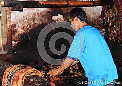 Man Washing Batik Editorial Photo | CartoonDealer.com #38378643