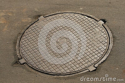 Manhole Sewer Cover Stock Photo | CartoonDealer.com #11464020
