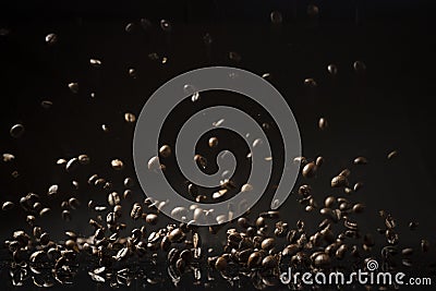 Many Coffee Beans Falling On Reflective Surface Stock Photo ...