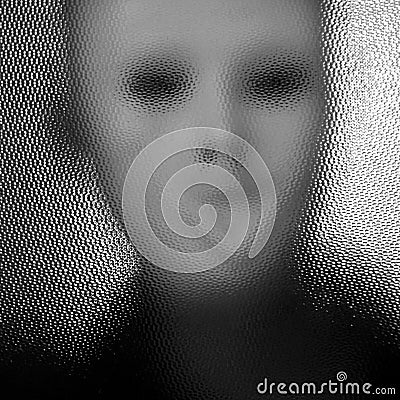 Masked Figure Behind Glass Stock Image | CartoonDealer.com #18844309