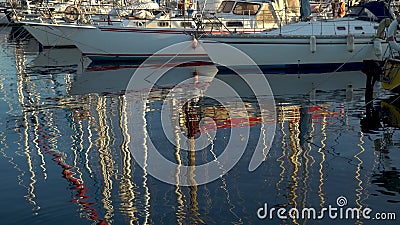 Masts of Ships are Reflected in the Water. Modern Ships are in the Bay ...