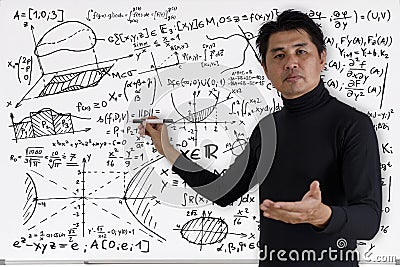 Mature Professor Teaching Mathematics To Students In Classroom. Teacher ...