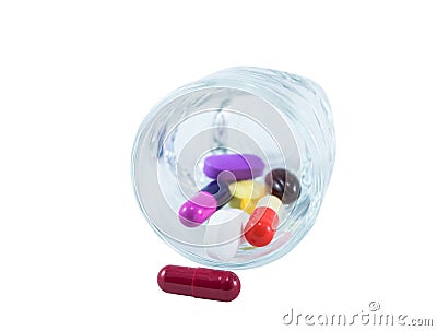 Measuring Glass With Capsules And Tablets Royalty-Free Stock Photo ...