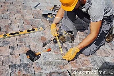 Measuring Process. Male Worker In Yellow Colored Uniform Have Job With ...