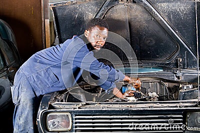 Mechanic Fixing Car Royalty Free Stock Photography - Image: 7457167