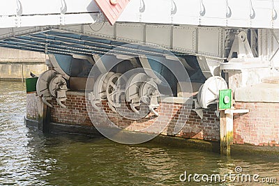Mechanism Of Drawbridge Across River. Bottom View Of Gears And Lift ...