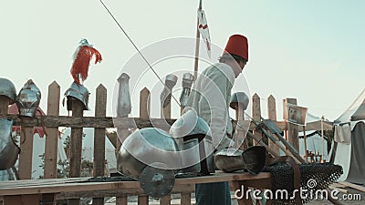 Medieval Master Rubbing Iron Armor, Helmets and Swords Stock Footage ...