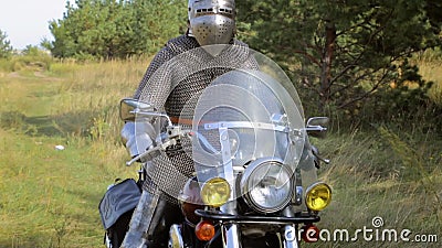 A Medieval Warrior in a Full Set of Armor, Chain Mail and a Helmet ...