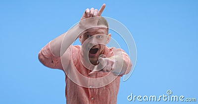 Young Man Taunting at Camera Stock Footage - Video of indoors, isolated ...