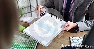 Meeting of Two Business Employees is Working at Office Table with Data ...