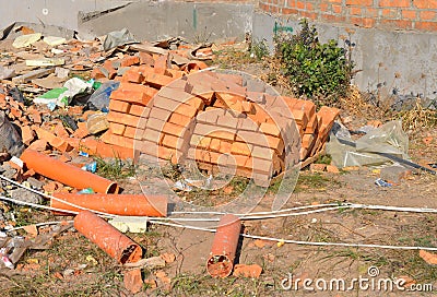 Messy Construction Site: A Pile Of Red Brick, Staked Bricks Among ...