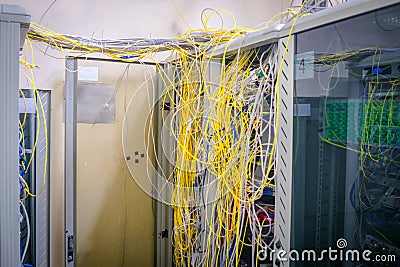 Messy Internet Wires Have A Connection To Computer Servers. Cabinets ...