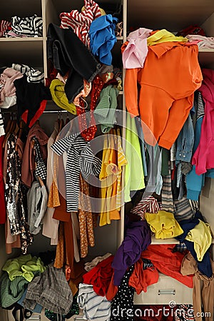 Messy Wardrobe With Different Clothes. Fast Fashion Concept Royalty ...