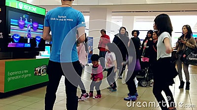 Microsoft Xbox Demonstrates Dance Game Stock Footage - Video of system ...