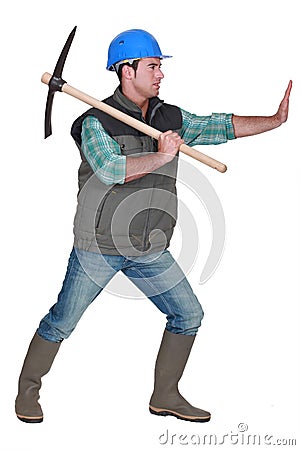Miner Using Pick-Axe Royalty-Free Stock Image | CartoonDealer.com #35904922
