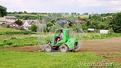 Mini Skid Steer Loader Clear Construction Site. Land Work. Small ...