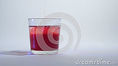 Mixing of Liquids in a Glass or Dissolution 4 Stock Footage - Video of ...