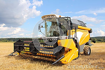 Modern Combine Harvester On Field Stock Photos - Image: 26254153
