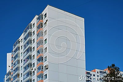 Modern Concrete Blocks Apartment Building With A Deep Blue Sky ...