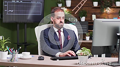 In Modern Creative Office Young Businessman Types on Computer Keyboard ...