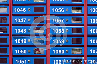 Modern Metal Mailboxes With Locks And Numbers Of An Apartment Building ...