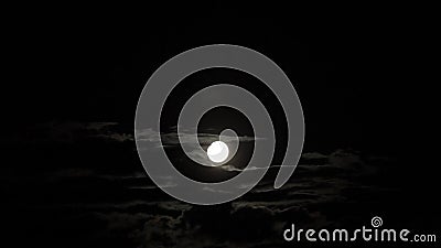 The Moon is Half Hidden by the Clouds, the Full Moon is Behind the ...