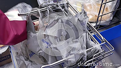 Motion of People Packing Foods at Check Out Counter Stock Video - Video ...