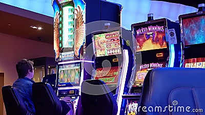 Motion of People Playing Slot Machine Inside Casino Stock Video - Video ...