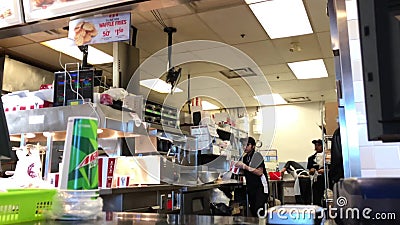 Motion of Worker Taking Order at Counter Inside KFC Restaurant Stock ...
