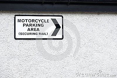 Motorcycle Parking Area Securing Rail Sign On White Wall Stock ...