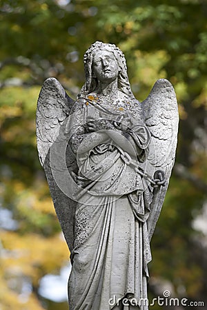 Mournful Statue Of Chained Angel Royalty Free Stock Photo - Image: 27819365
