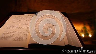 Moving Camera Towards an Opened Arabic Holly Bible Inside of an Ancient ...