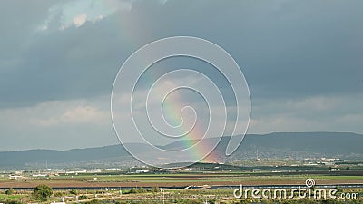 Moving Rainbow Over the Fields of Galilee, Israel with Sun Rays Stock ...