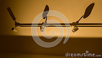 Multiple Spotlights Railing On Ceiling Wall. Royalty-Free Stock Photo ...
