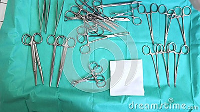 Multiple Surgery Instruments on Blue Table Above View. Surgeon Take ...