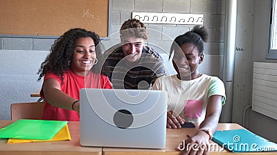 Multiracial Group of High School Students Doing Homework Research ...