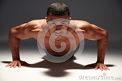 Muscular, Shirtless Young Man Doing Press-ups Royalty-Free Stock ...