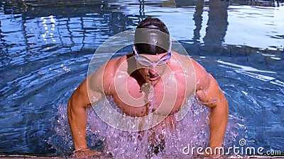 Fit Swimmer Emerging from Pool and Pulling Himself Up Stock Video ...