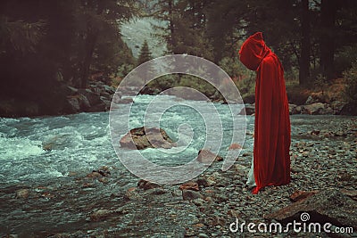 Mysterious Red Cloaked Figure Stock Photo | CartoonDealer.com #197668056