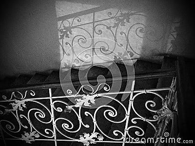 Mysterious Staircase With A Forged Metal Railing At Night In The Dark ...