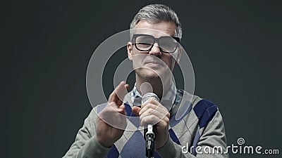 Nerd Guy Adjusting the Microphone before Giving a Speech Stock Footage ...